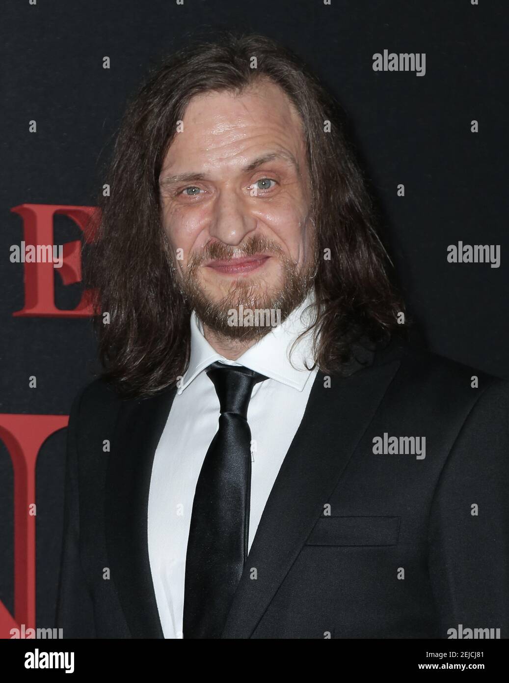 Niall Greig Fulton walking the red carpet at the Premiere of Universal ...