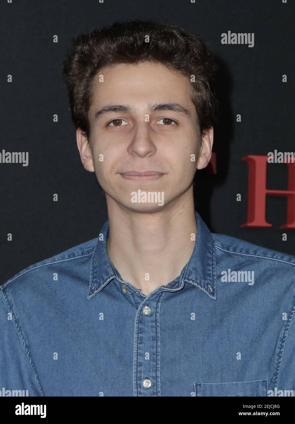 Gabe Erwin walking the red carpet at the Premiere of Universal Pictures ...