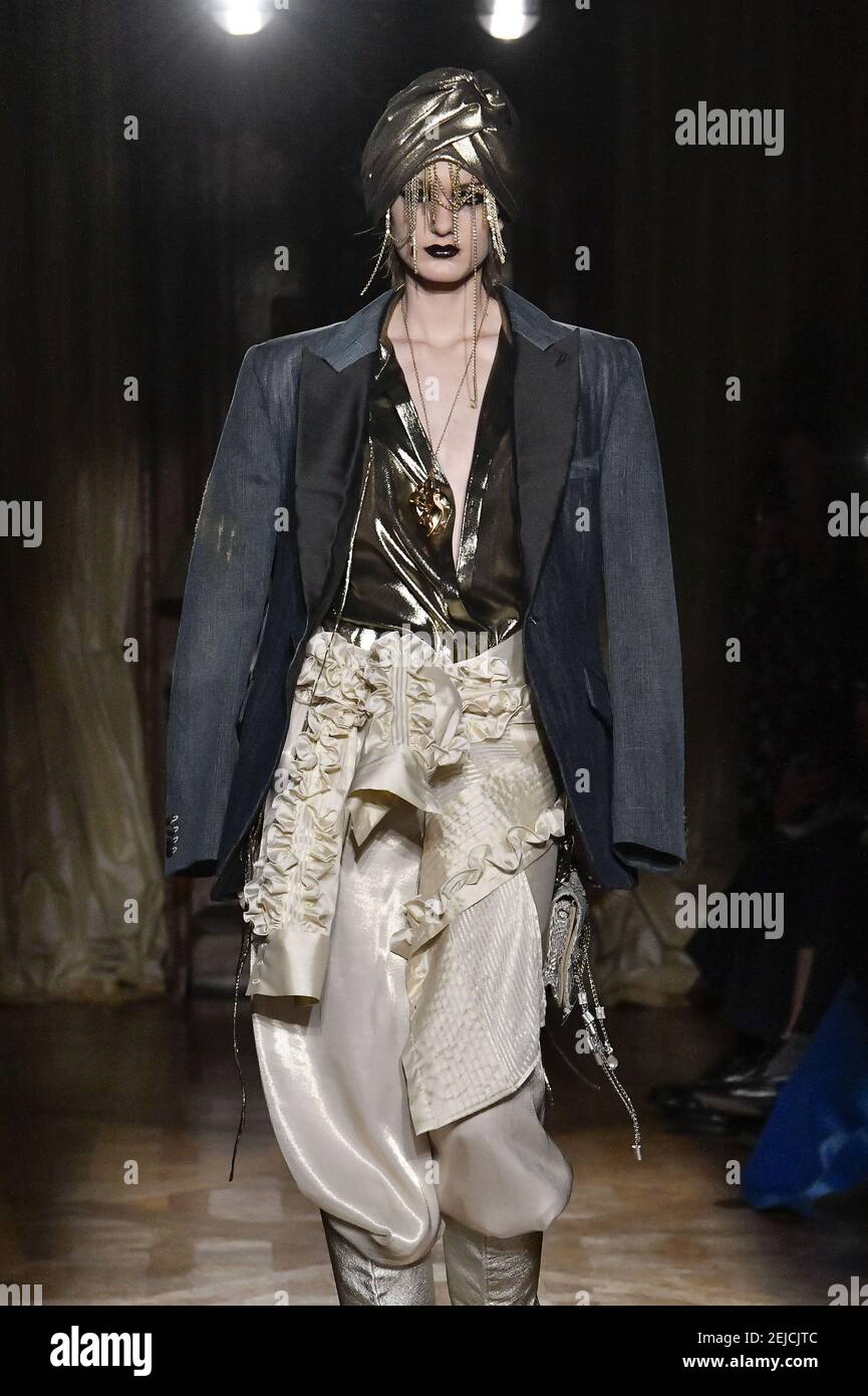 Model walks on the runway during the Ronald van der Kemp Haute Couture ...