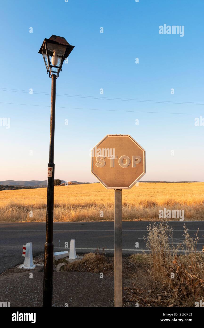 Sun-faded stop sign in southern spain Stock Photo - Alamy