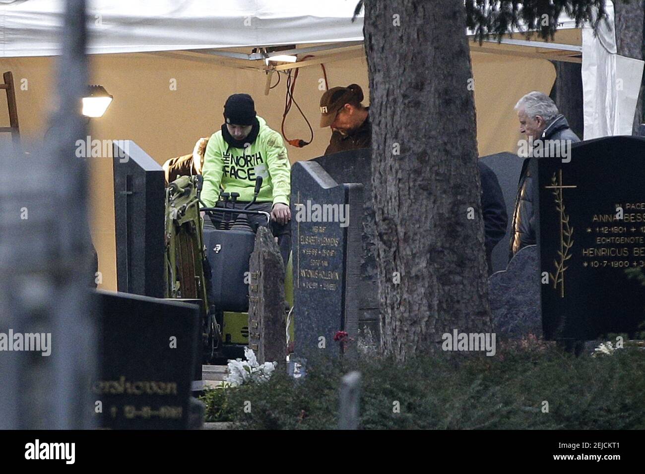 Police search a graveyard in Maastricht, The Netherlands on Jan. 22 ...
