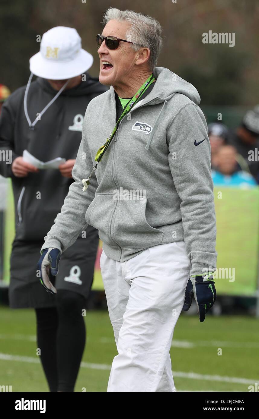 NFC Team Seattle Seahawks coach Pete Carroll cheers during practice for ...