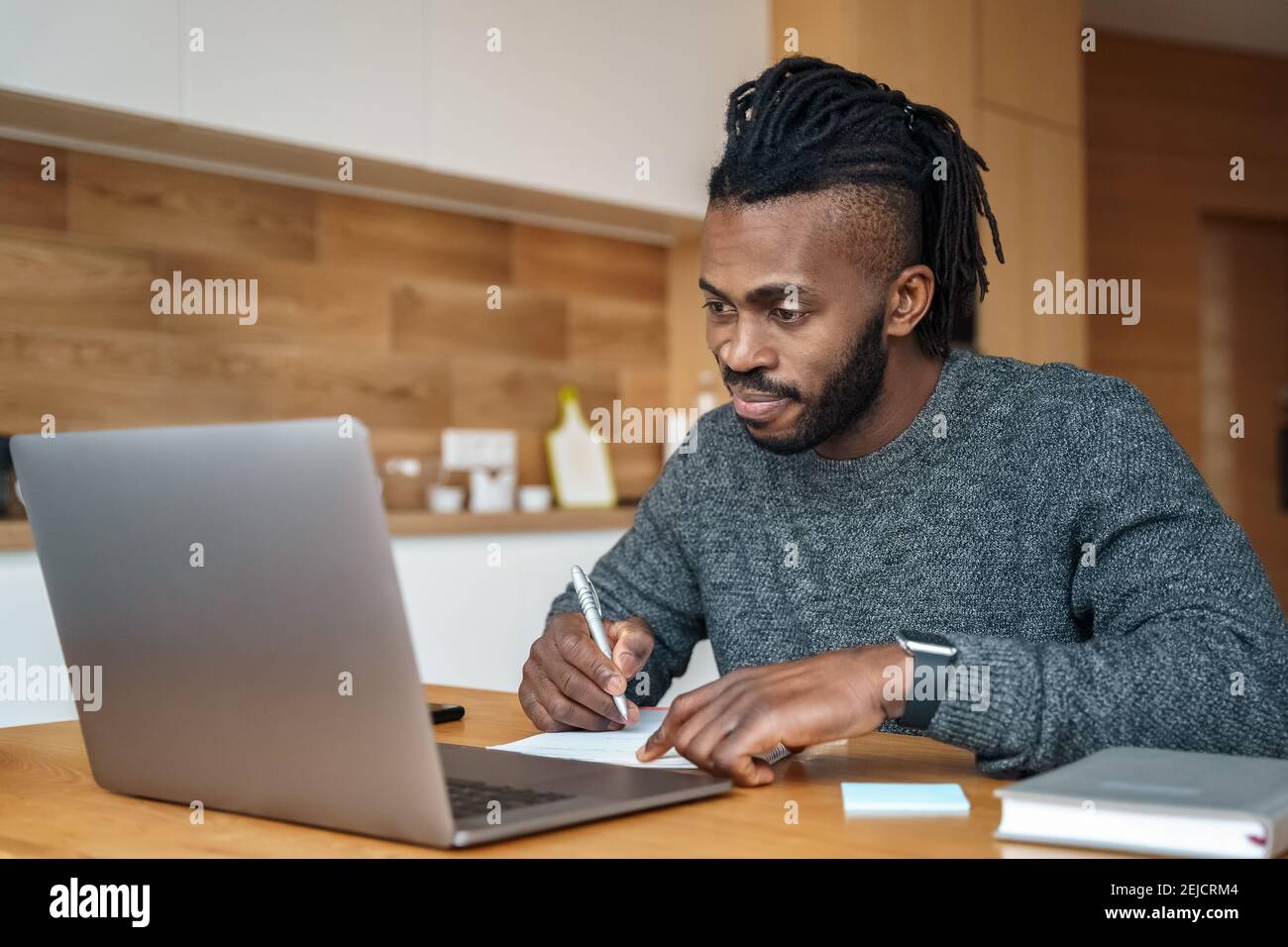African american man freelancer making hi-res stock photography and ...