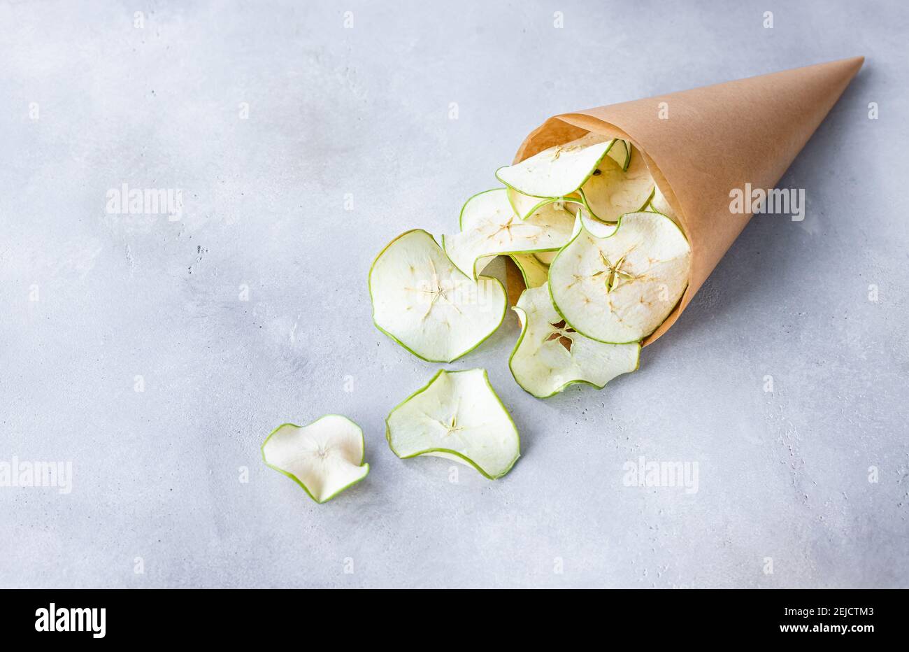 dried apple chips packaged in paper eco pack Stock Photo - Alamy