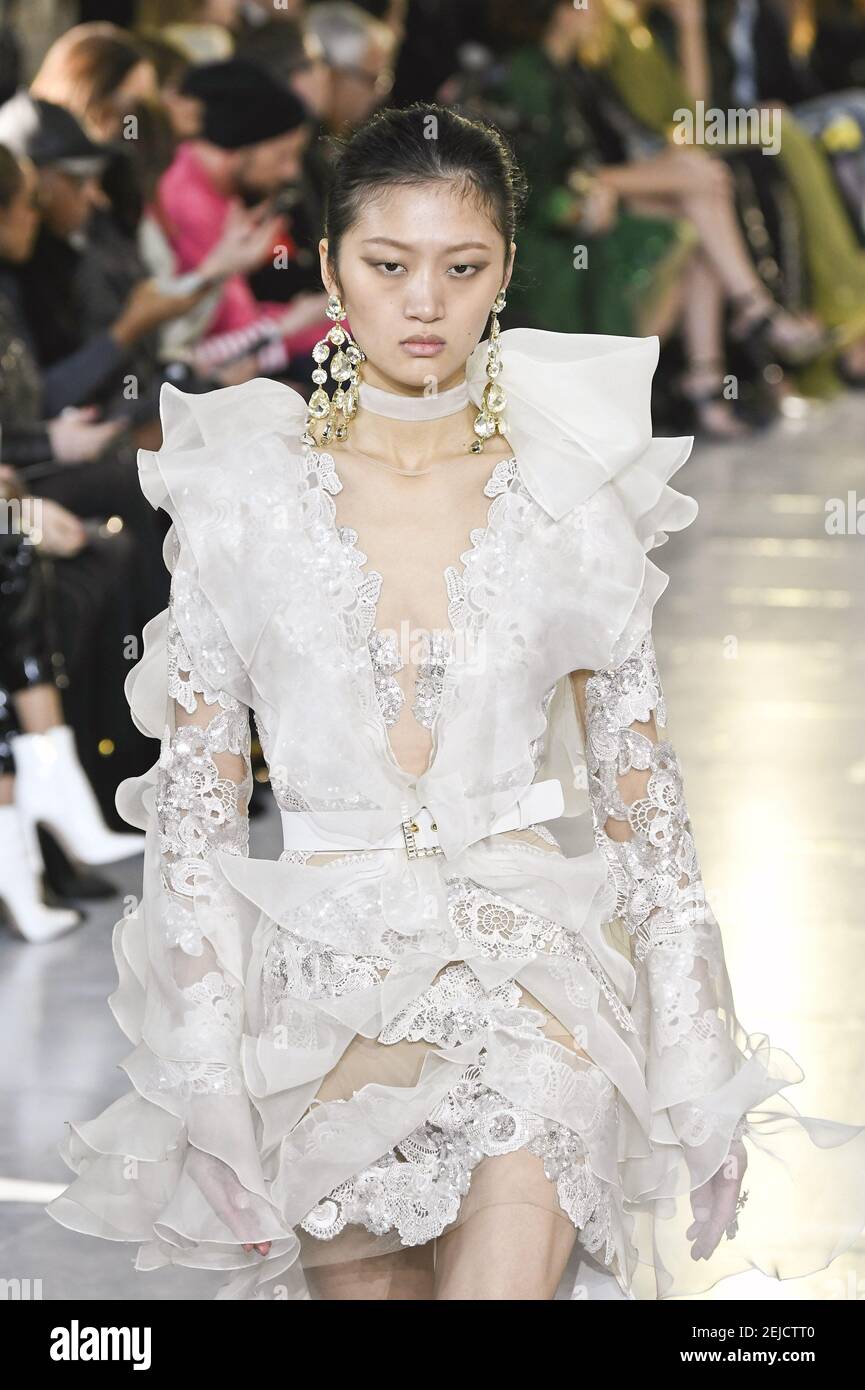 Yilan Hua walks on the runway during the Elie Saab Haute Couture ...