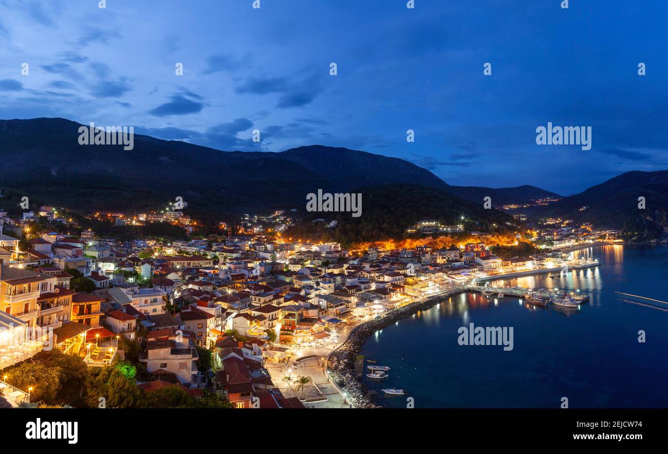 Parga town, panoramic nightscape from the town's castle, during blue ...