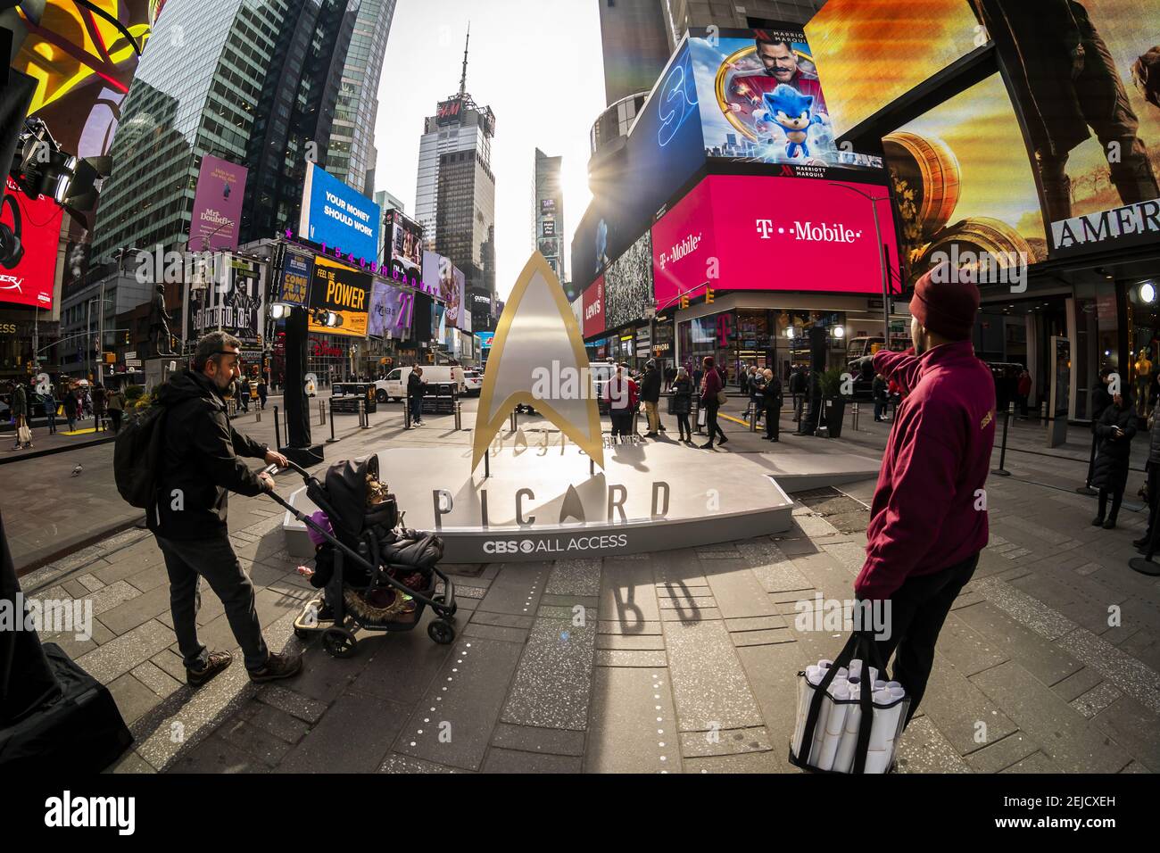 Visitors to Times Square in New York on Thursday, January 23, 2020 pose ...