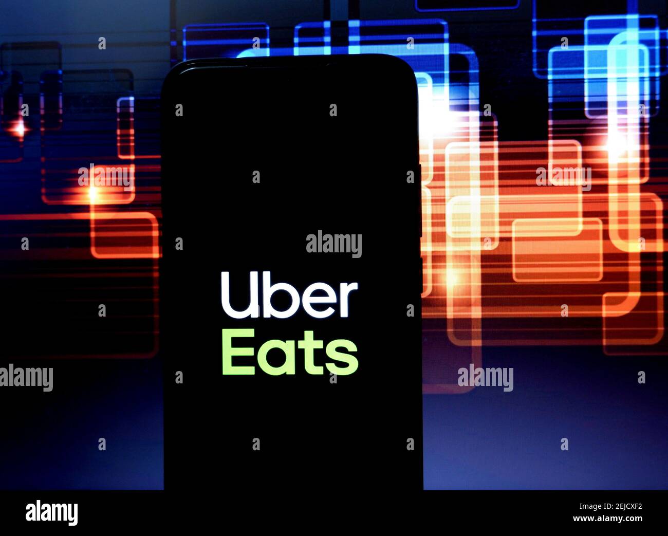 In this photo illustration a Popular food delivery application Uber ...