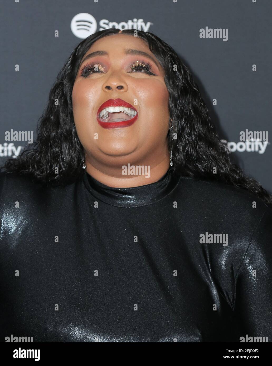 Lizzo walking the red carpet at the Spotify Hosts "Best New Artist ...