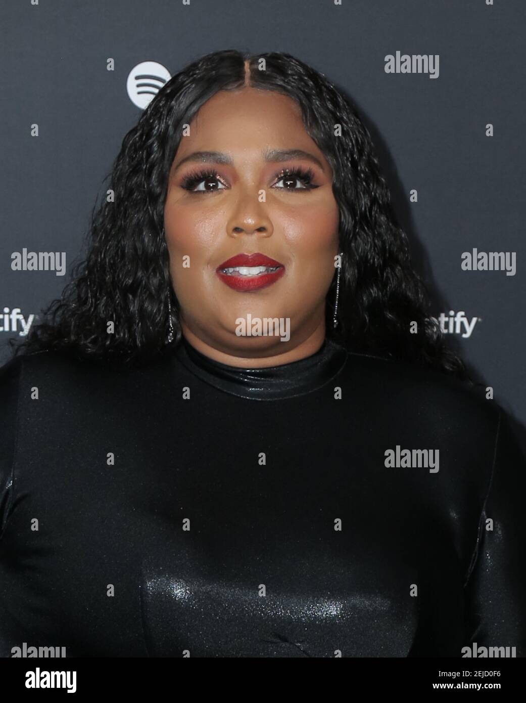 Lizzo walking the red carpet at the Spotify Hosts "Best New Artist ...