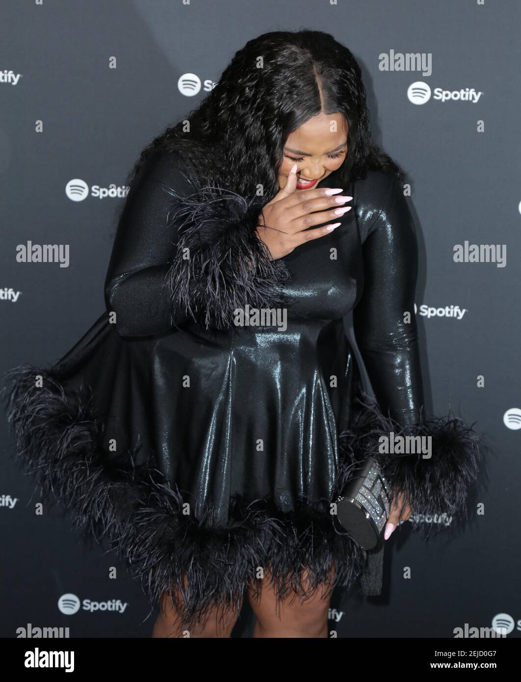 Lizzo walking the red carpet at the Spotify Hosts "Best New Artist ...