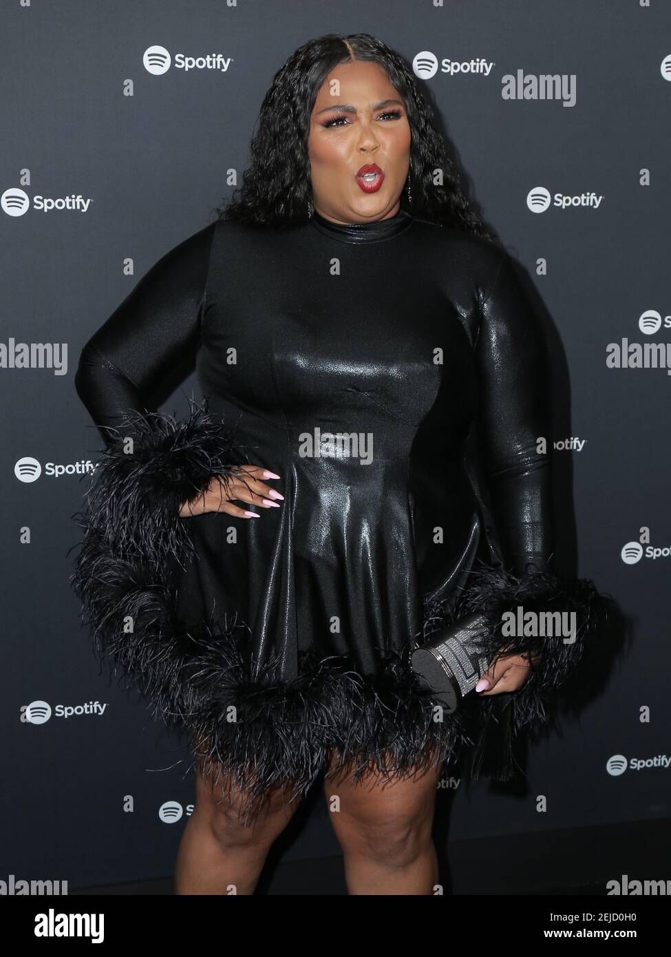 Lizzo walking the red carpet at the Spotify Hosts "Best New Artist ...