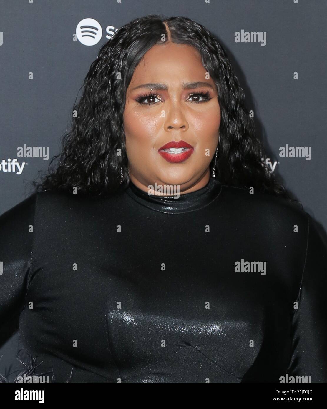 Lizzo walking the red carpet at the Spotify Hosts "Best New Artist ...