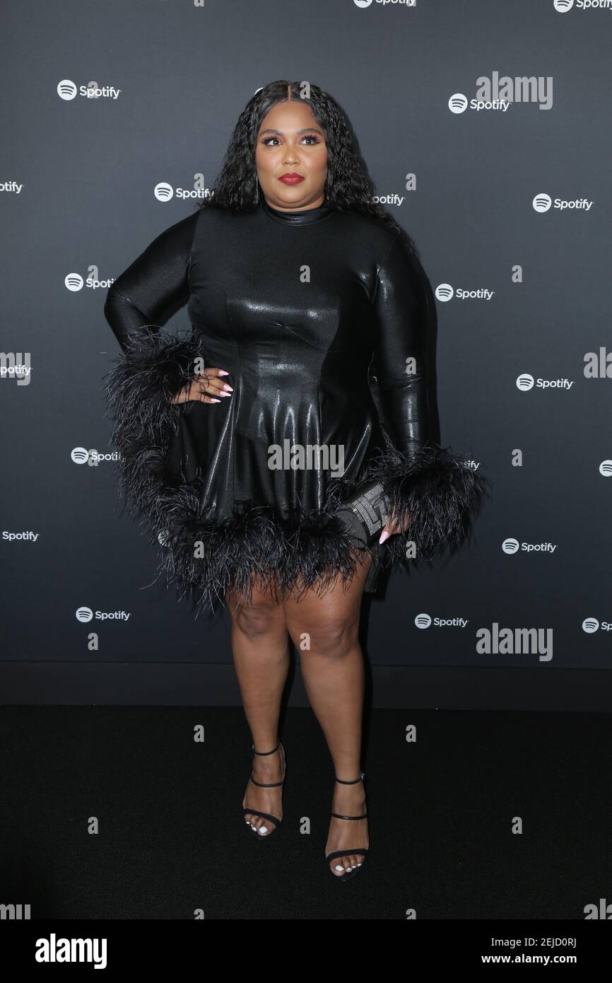 Lizzo walking the red carpet at the Spotify Hosts "Best New Artist ...