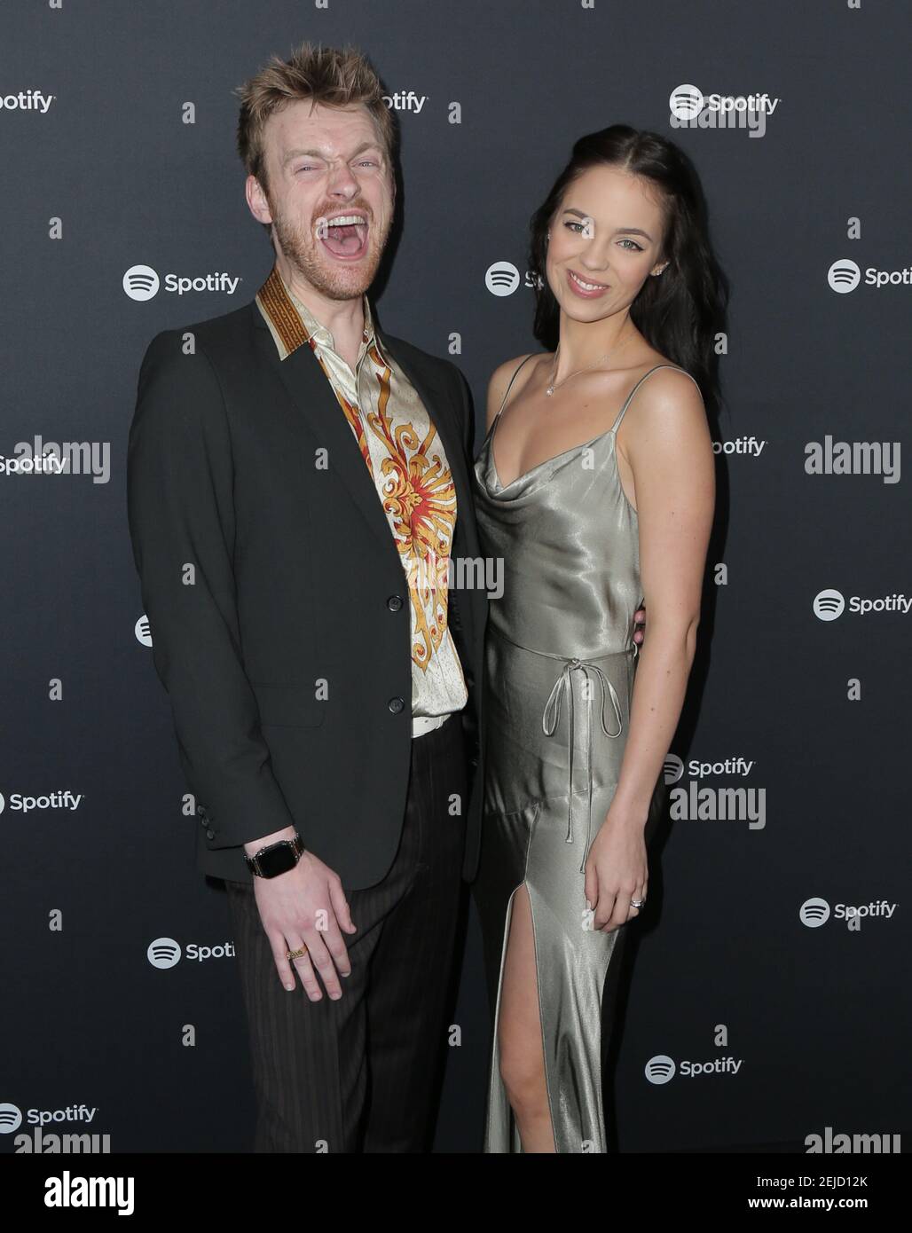 Finneas O'Connell, Claudia Sulewski walking the red carpet at the ...