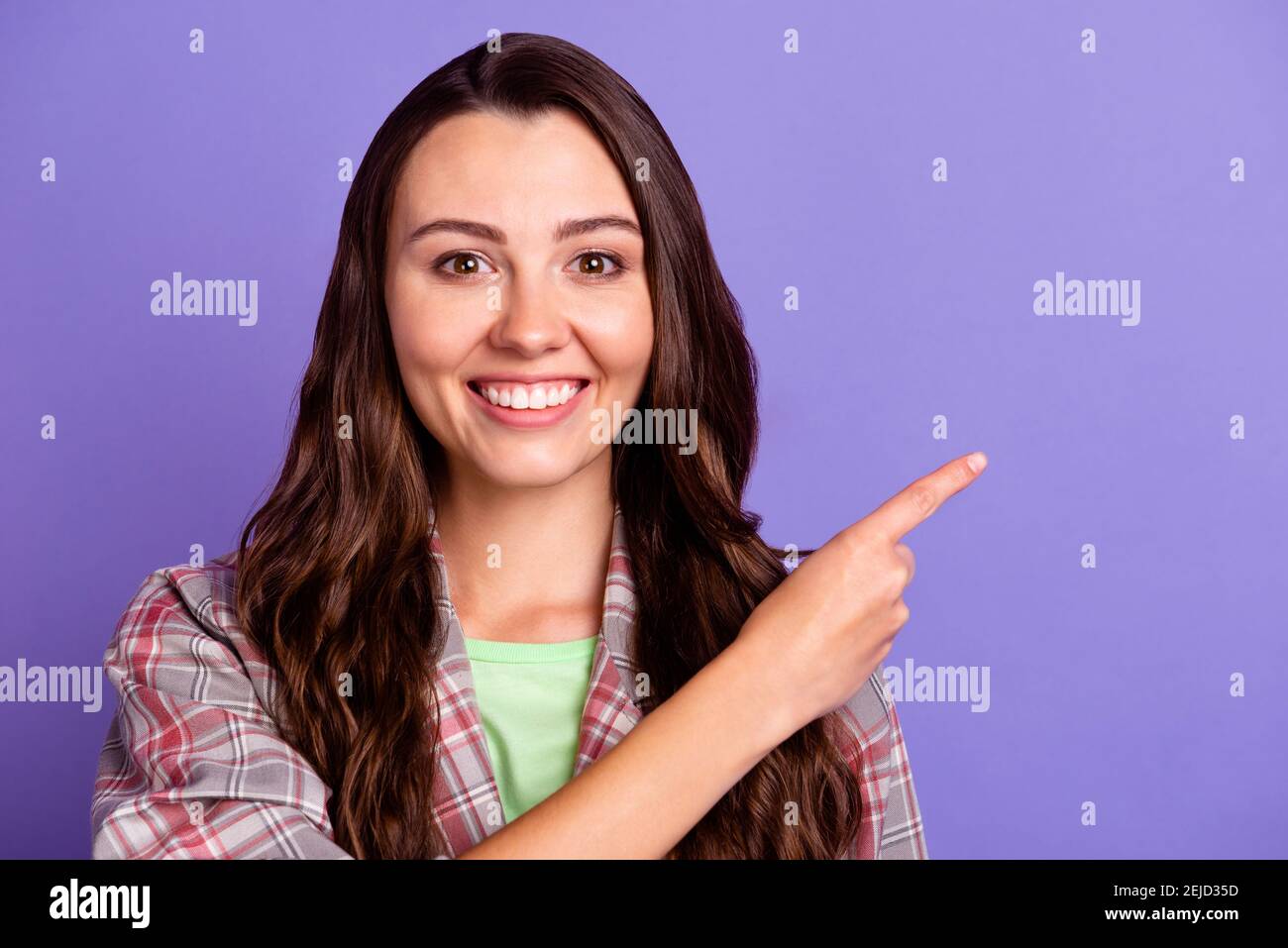 Photo of happy nice young charming lady point finger empty space sale ...