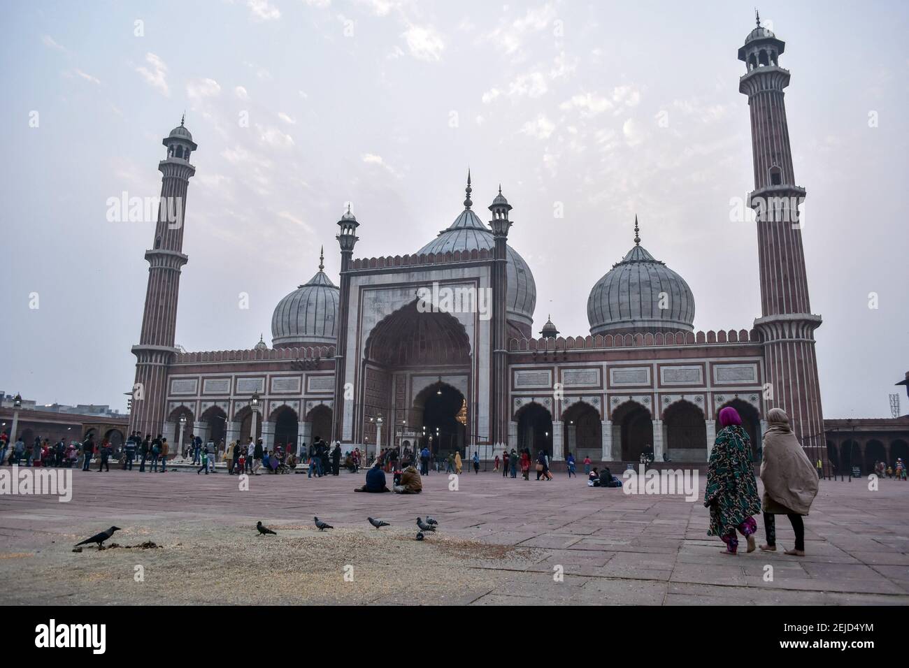 Visitors at the Jama Masjid or Grand Mosque in Delhi. Jamia Masjid or ...