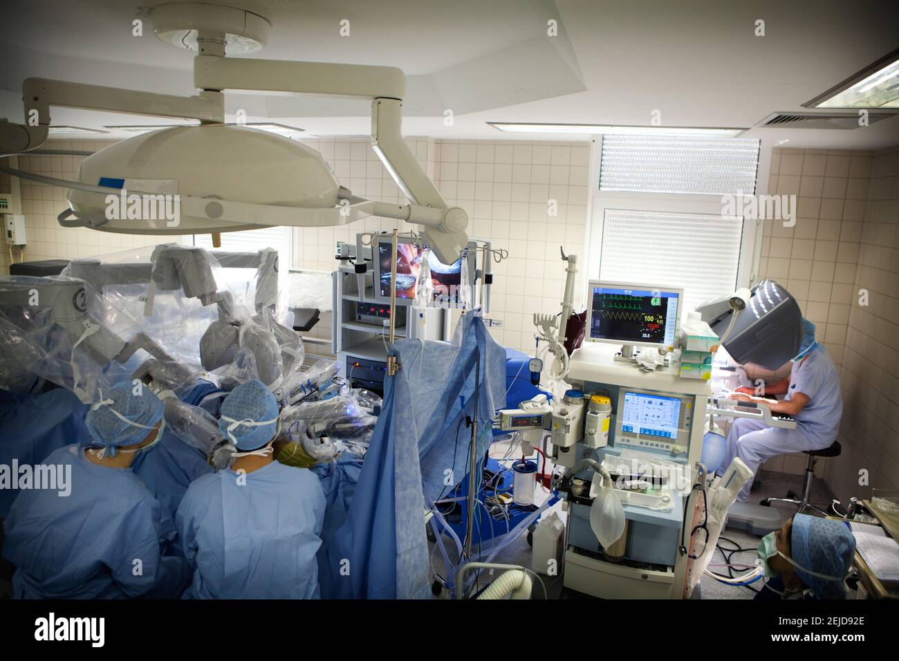 Surgeon performing a prostatectomy, removal of the prostate, using a ...