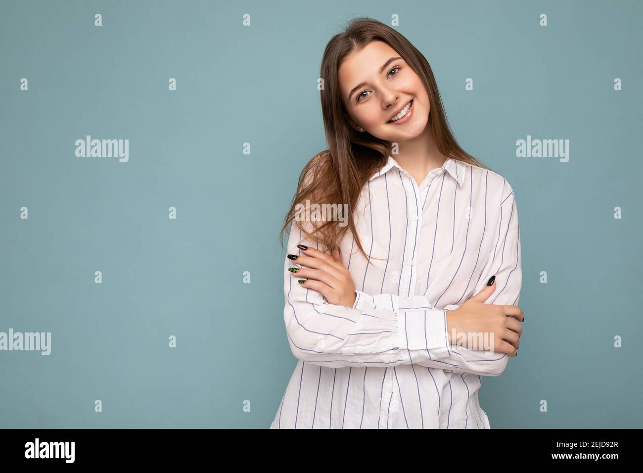 Young attractive brunette female person with sincere emotions isolated ...