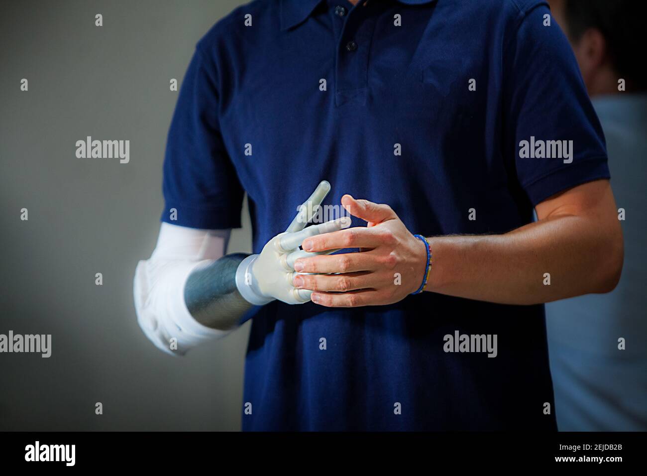 Athlete equipped with a bionic hand or robotic prosthesis using ...