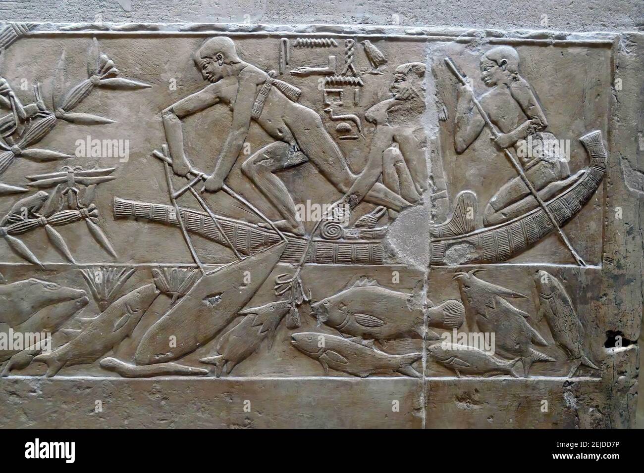 Closeup of bas relief figures showing daily life in ancient Egypt ...
