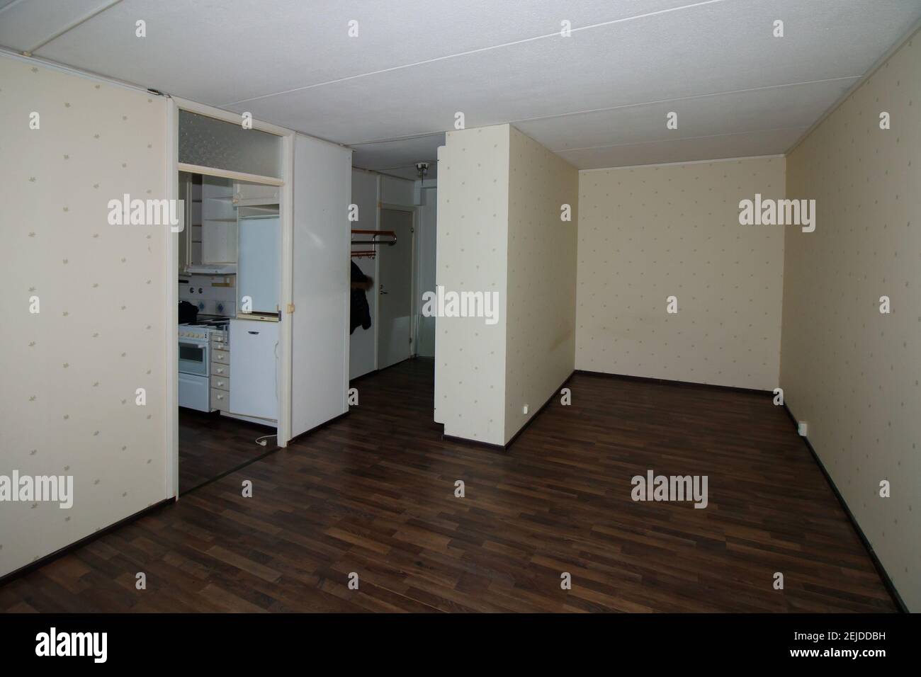 Interior of empty old apartment studio with living room and kitchen ...