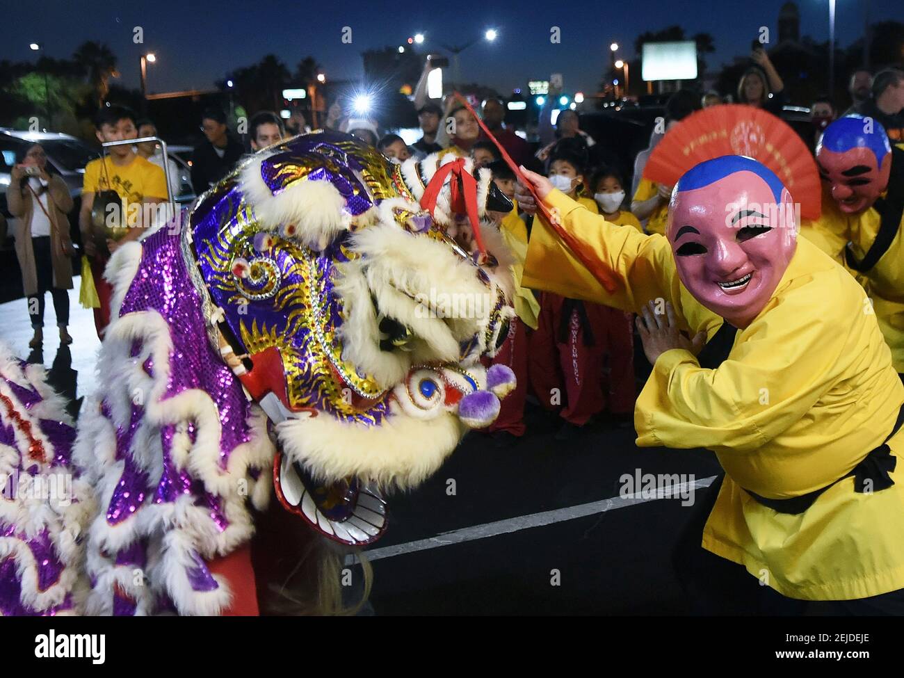 Members of the Wah Lum Kung Fu Temple perform a lion dance outside Lam ...