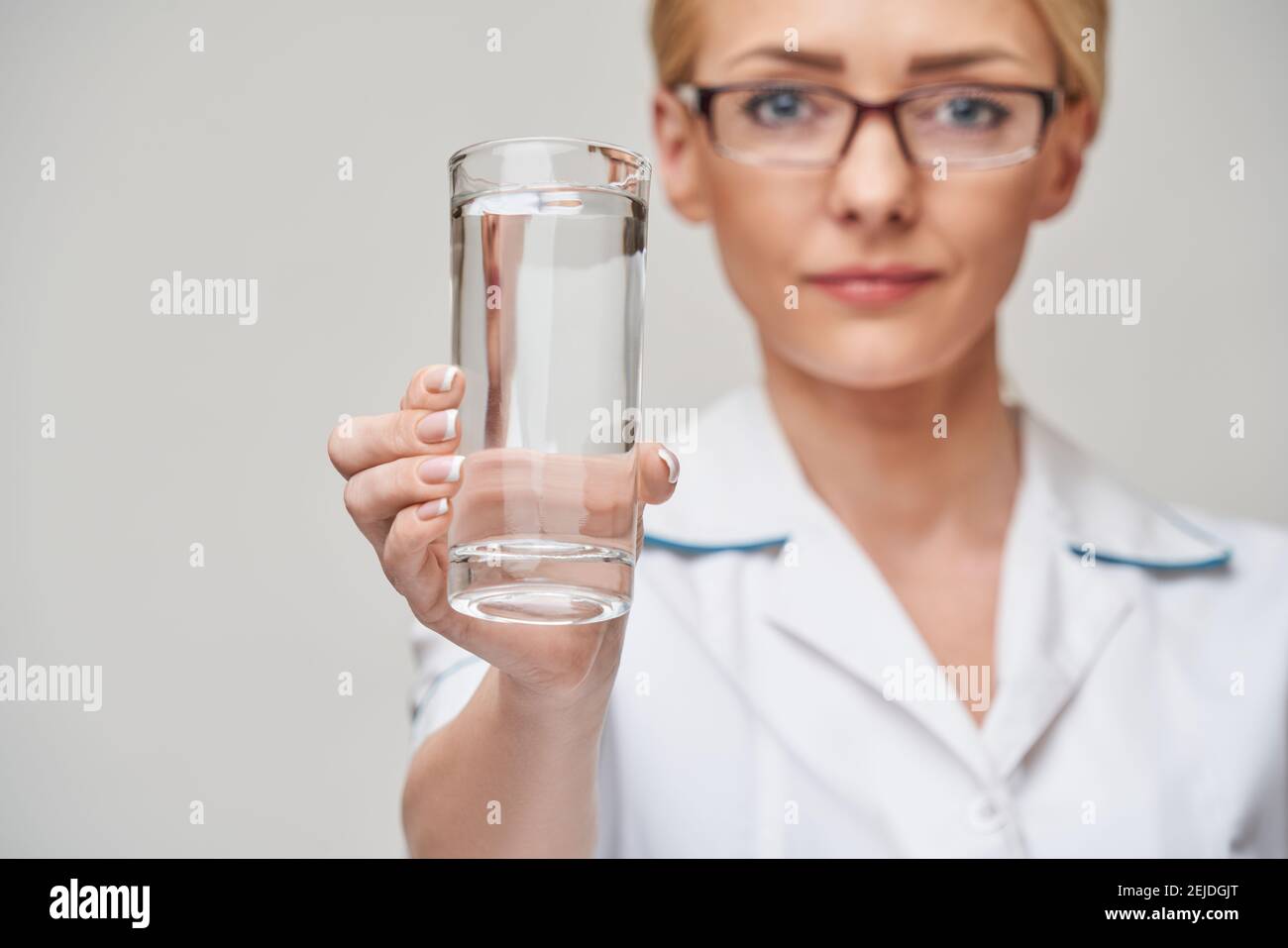 Doctor water glass drink hi-res stock photography and images - Alamy