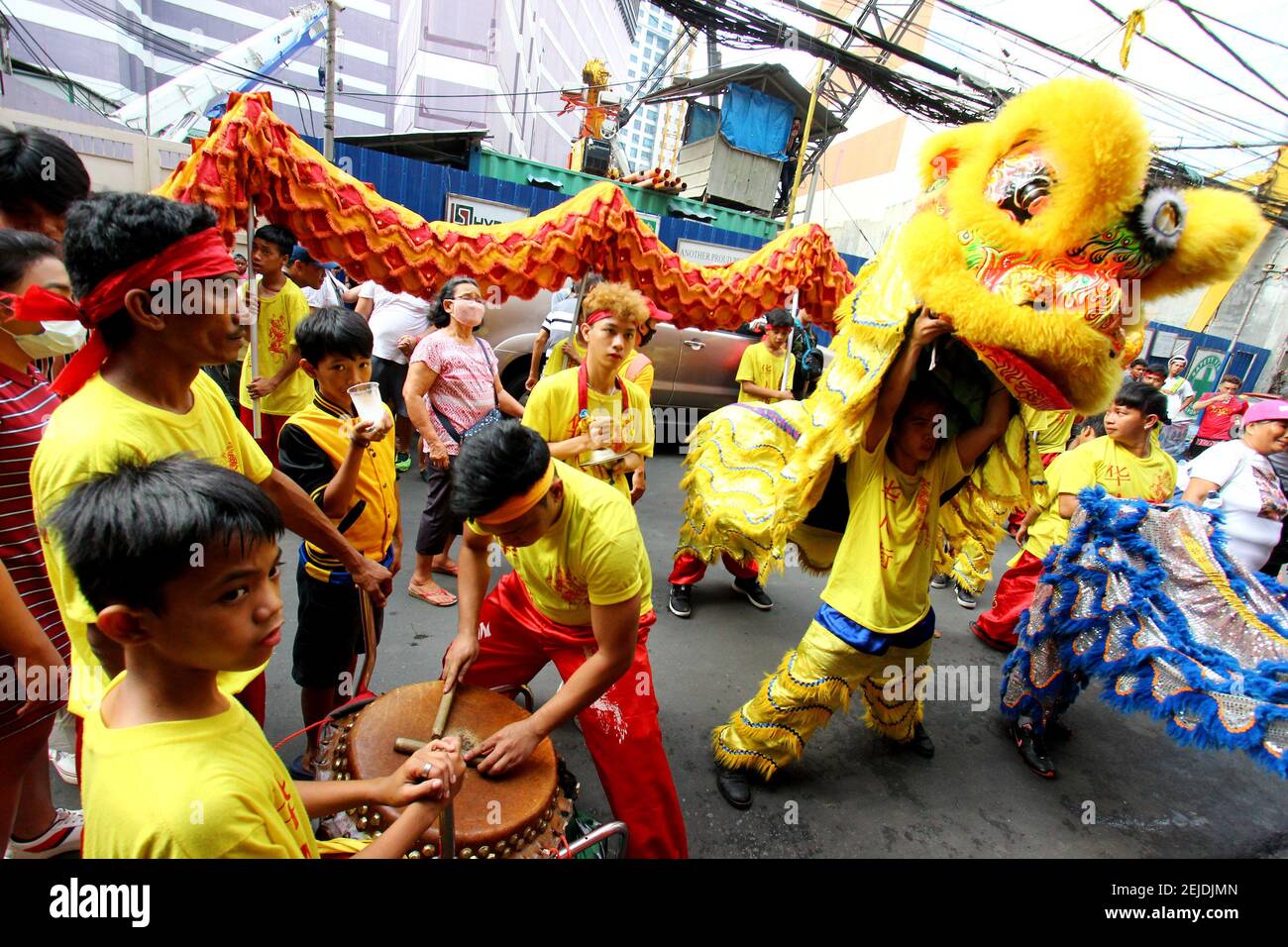A group of Dragon dancers performed their act in various streets of ...