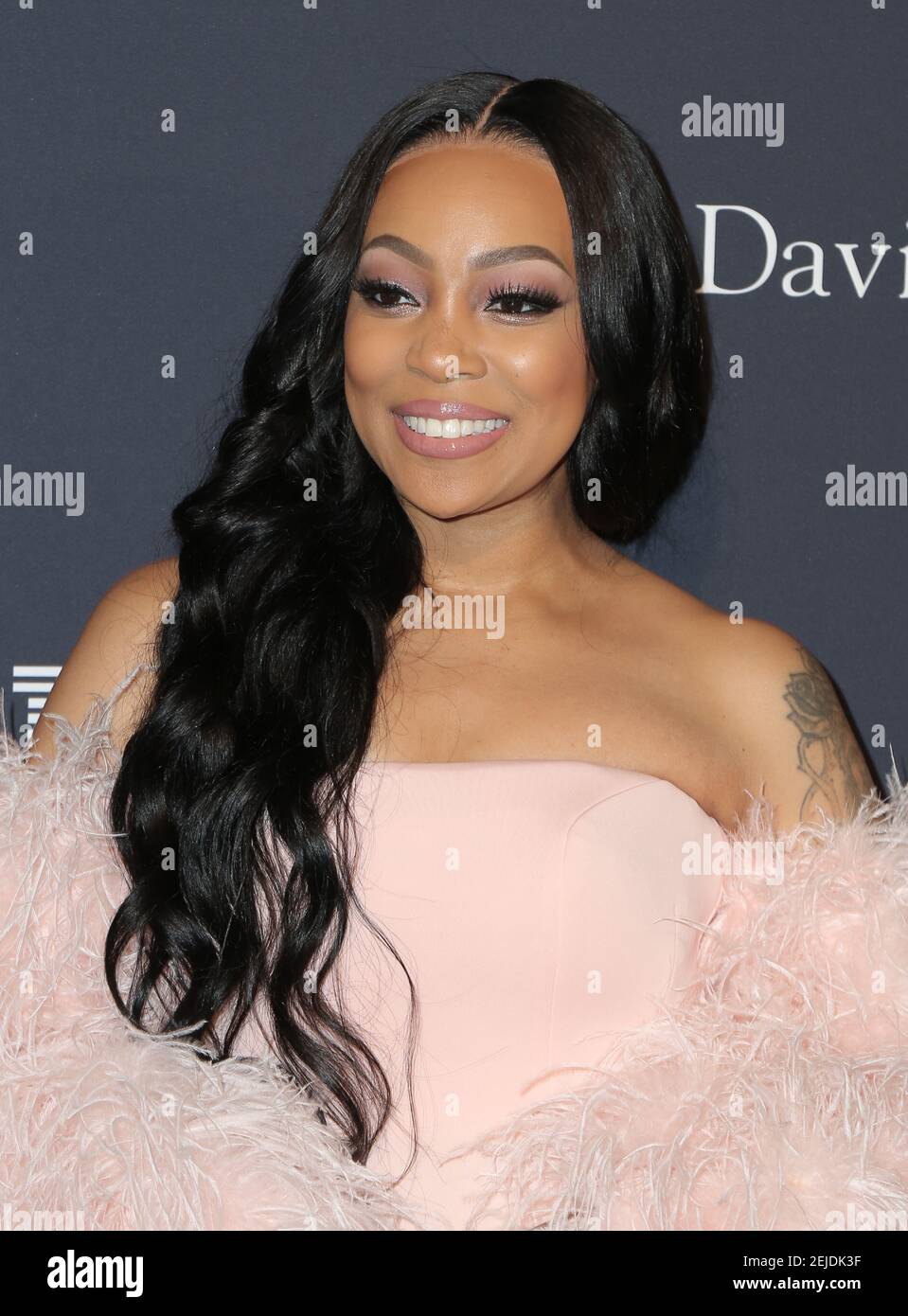 Monica walking the red carpet at the Clive Davis' 2020 Pre-Grammy Gala ...