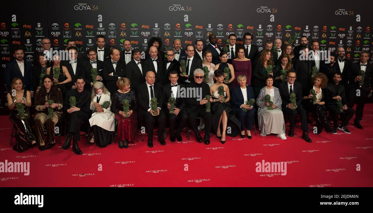 Actors and actresses pose for a photo family on the red carpet during ...