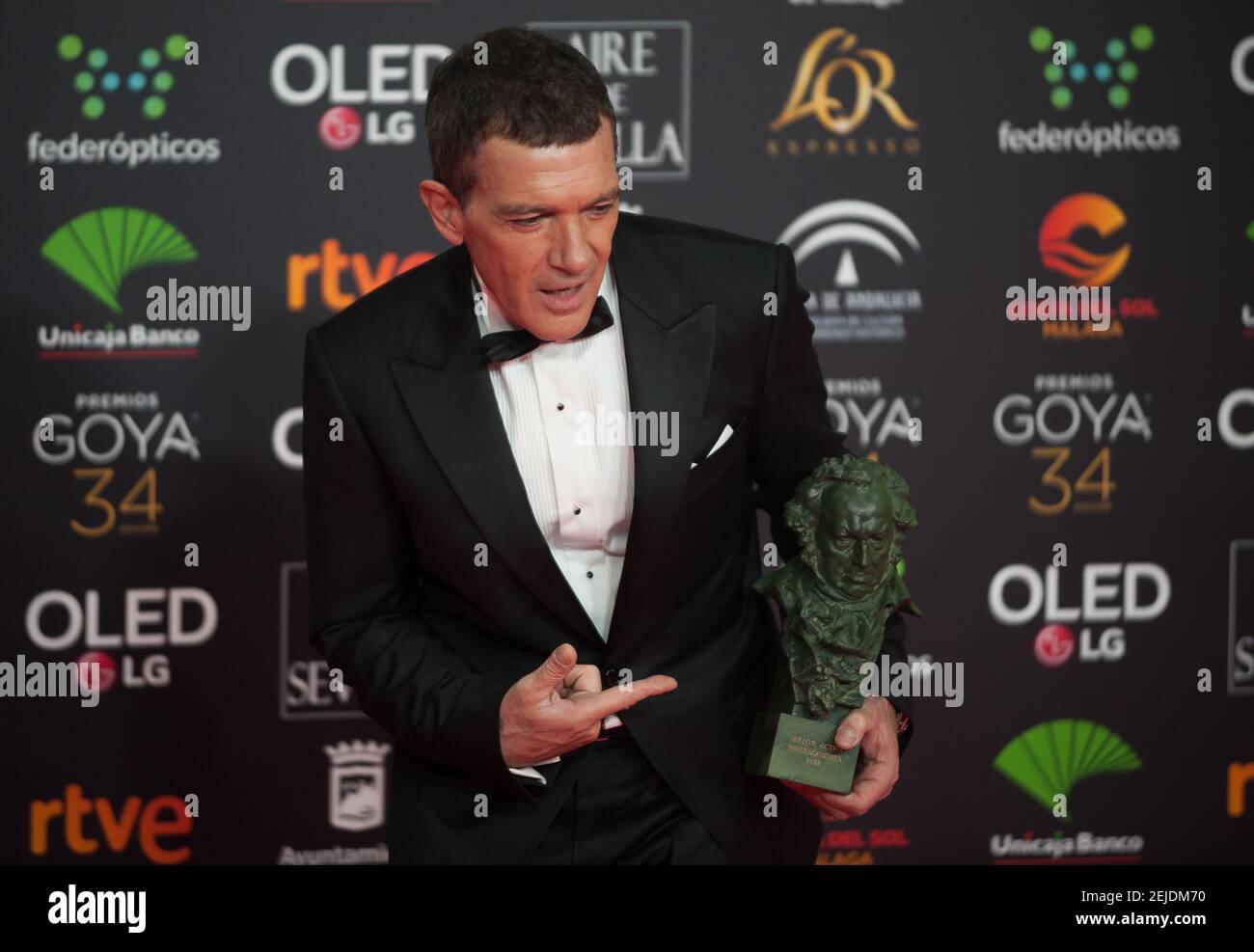 Spanish actor Antonio Banderas poses with his Goya award for the best ...