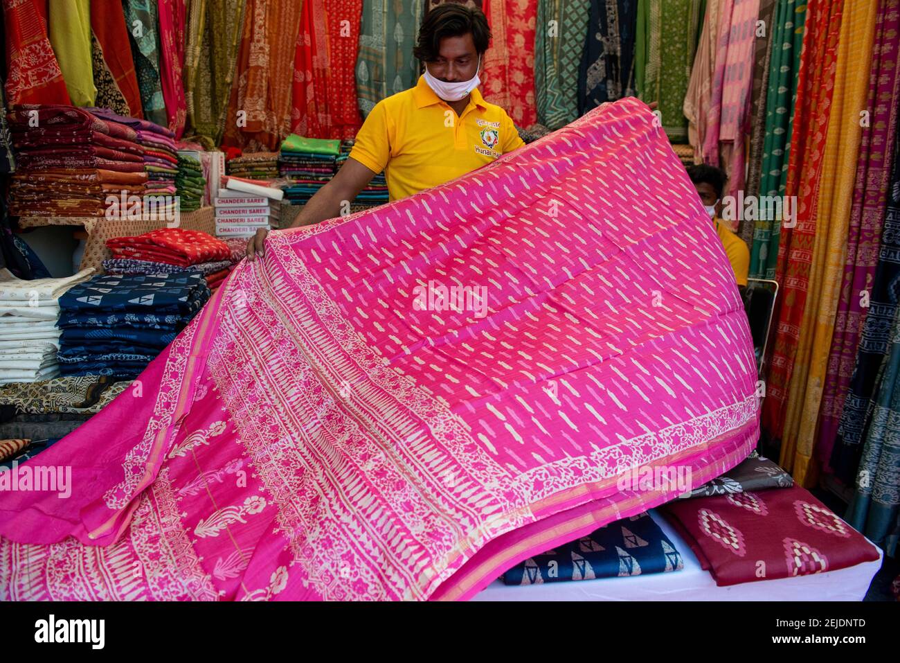 Man shows a chanderi saree made by cotton and silk mix during the 26th ...