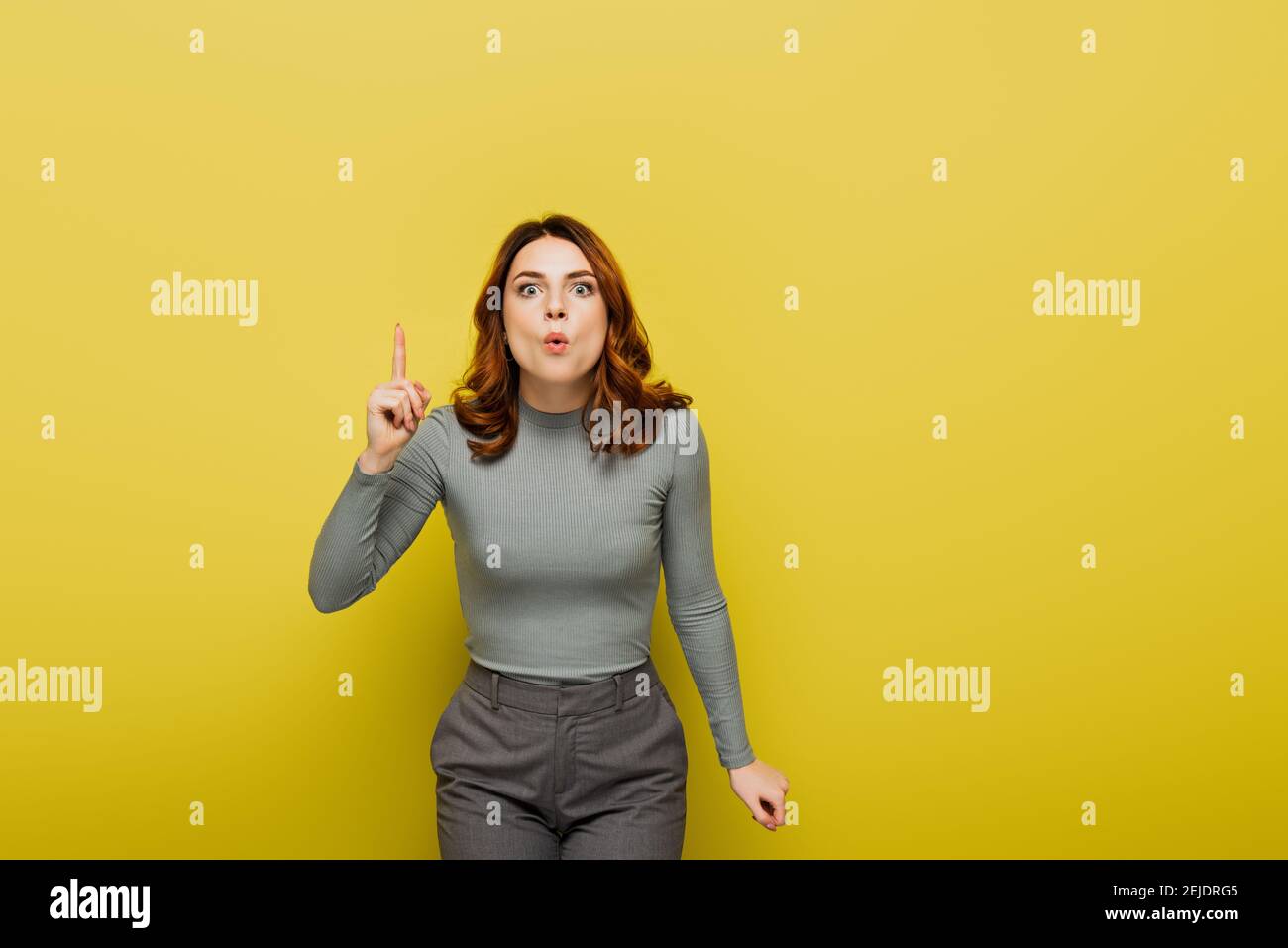 Young surprised woman having idea hi-res stock photography and images ...