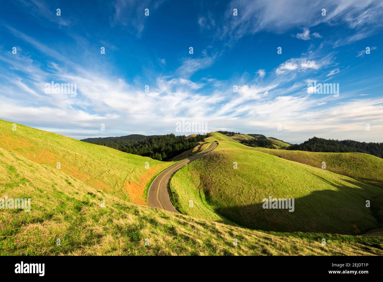Winding road through hills in hi-res stock photography and images - Alamy