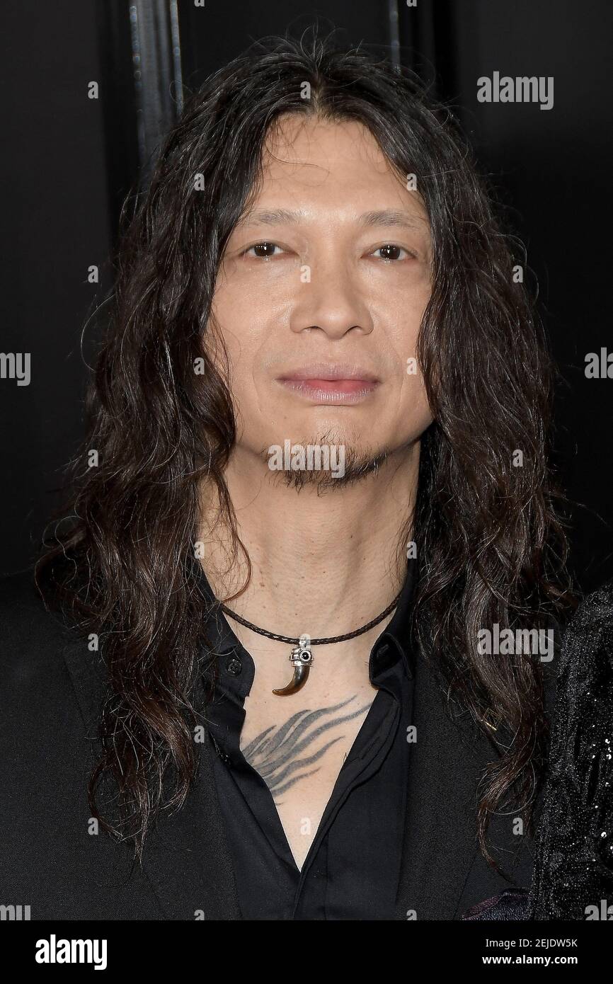Damien Sisson arrives at the 62nd Annual Grammy Awards red carpet held ...