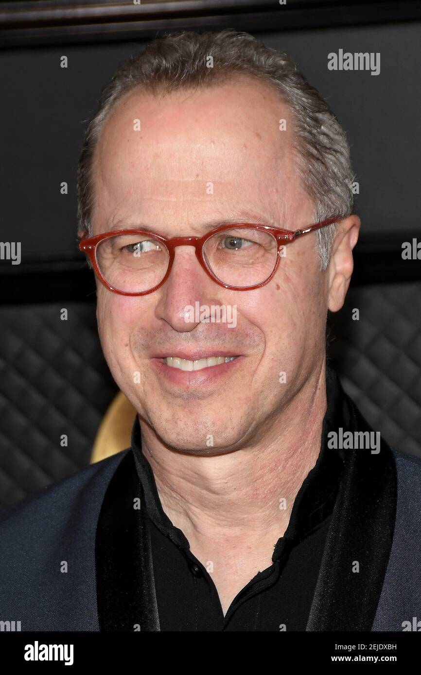 David Alan Miller arrives at the 62nd Annual Grammy Awards red carpet ...