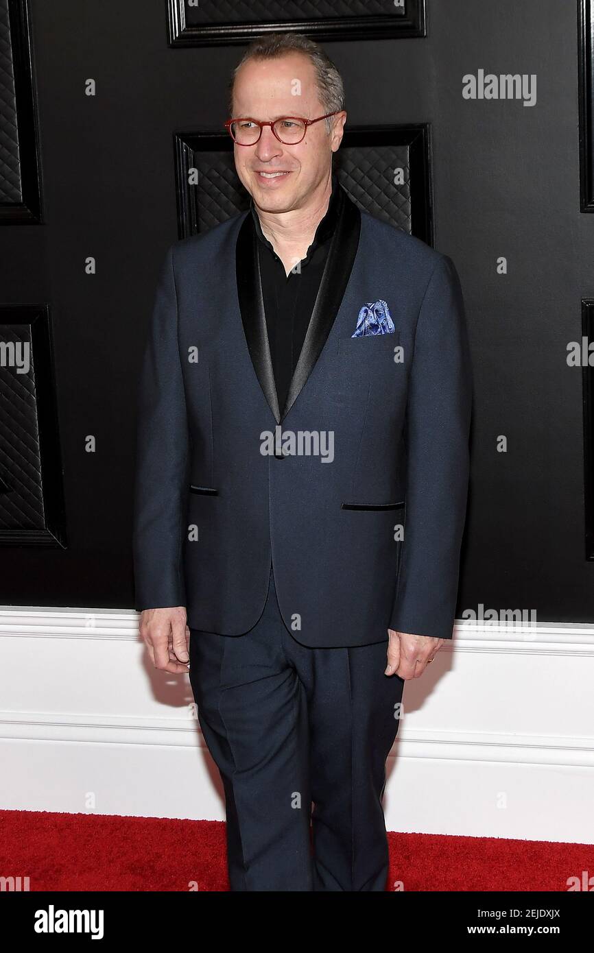 David Alan Miller arrives at the 62nd Annual Grammy Awards red carpet ...