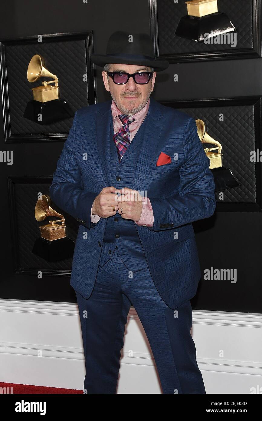 Elvis Costello arrives at the 62nd Annual Grammy Awards red carpet held ...