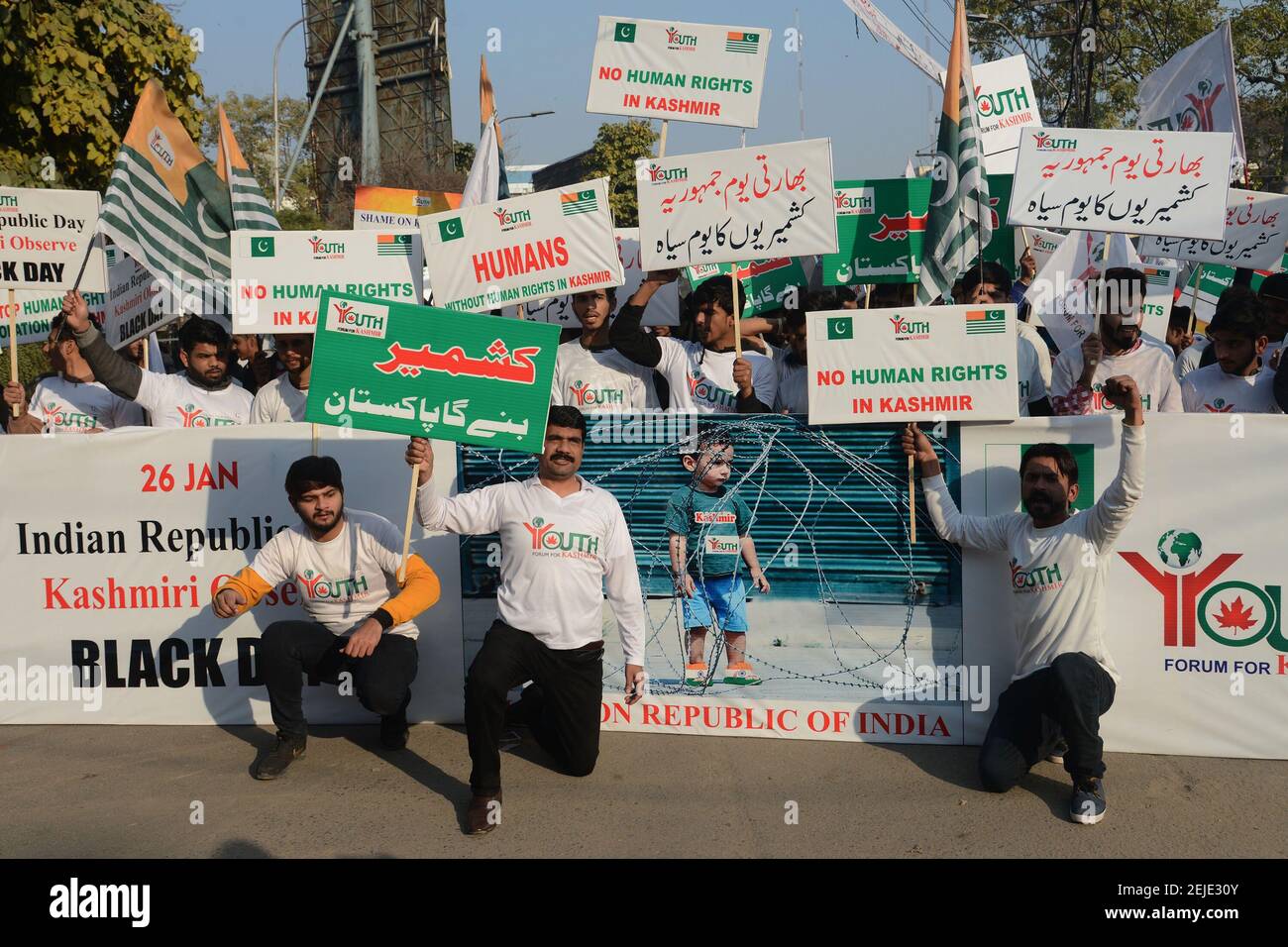 Pakistani custom officials destroying the alcohol bottles with heavy ...