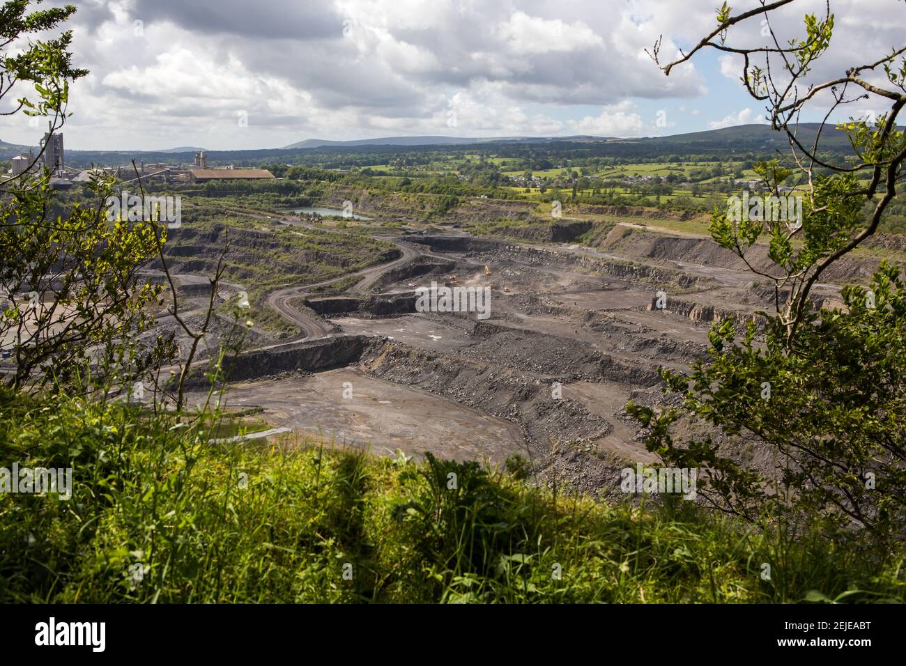 Large limestone quarry in Clitheroe, Ribble valley. Excavators and ...