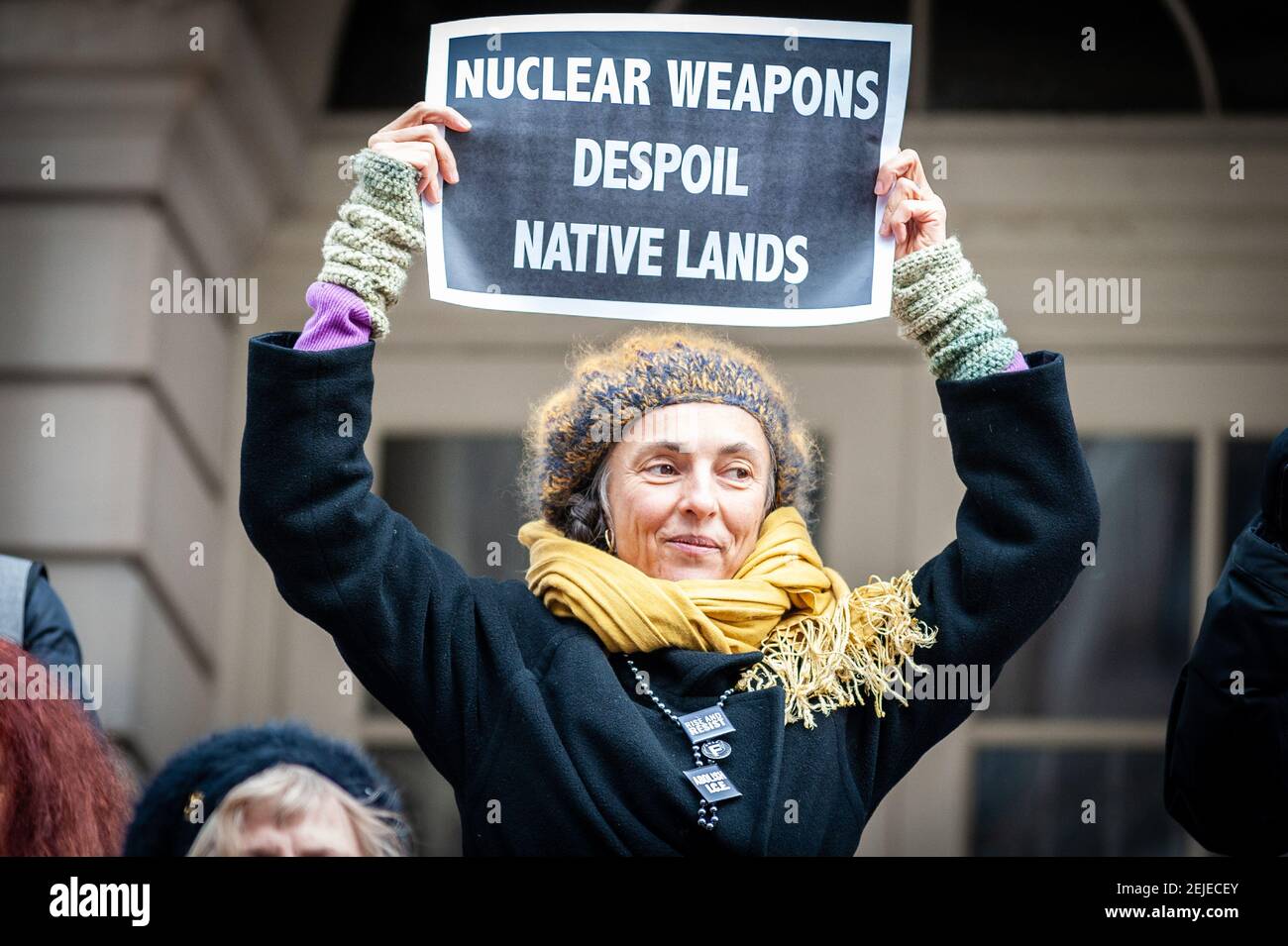 Activists rally at a press conference calling for the divestment from ...