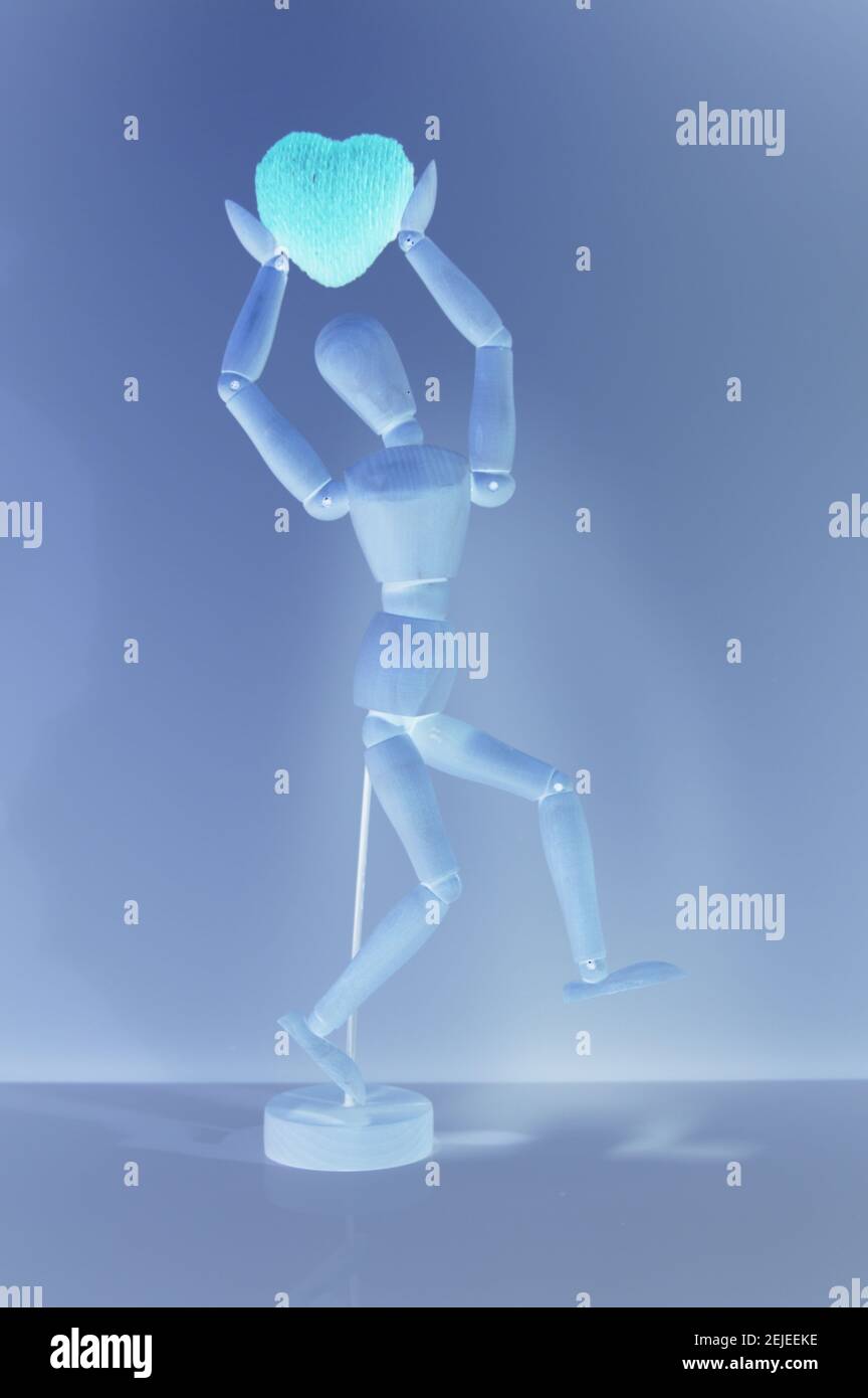 Wooden dummy man on white background Stock Photo - Alamy
