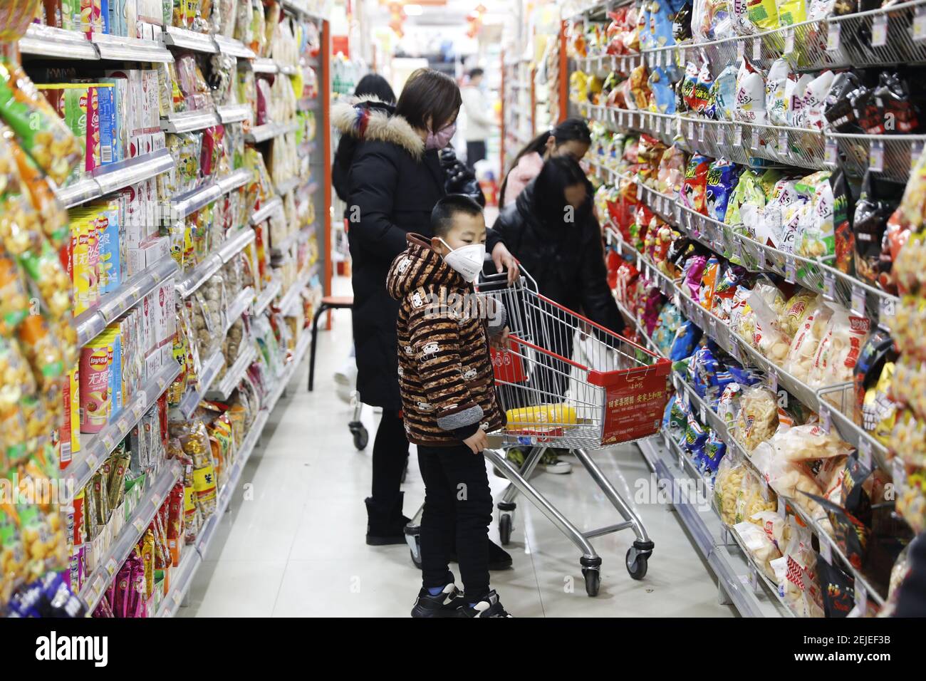 Chinese customers wearing face masks for prevention of the new ...