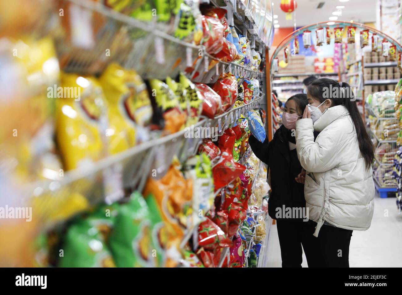 Chinese customers wearing face masks for prevention of the new ...