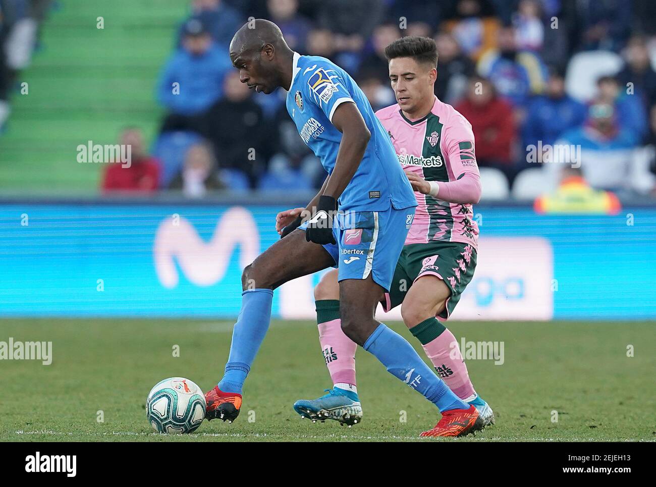 Getafe CF's Allan Nyom (l) and Real Betis Balompie's Alex Moreno during ...