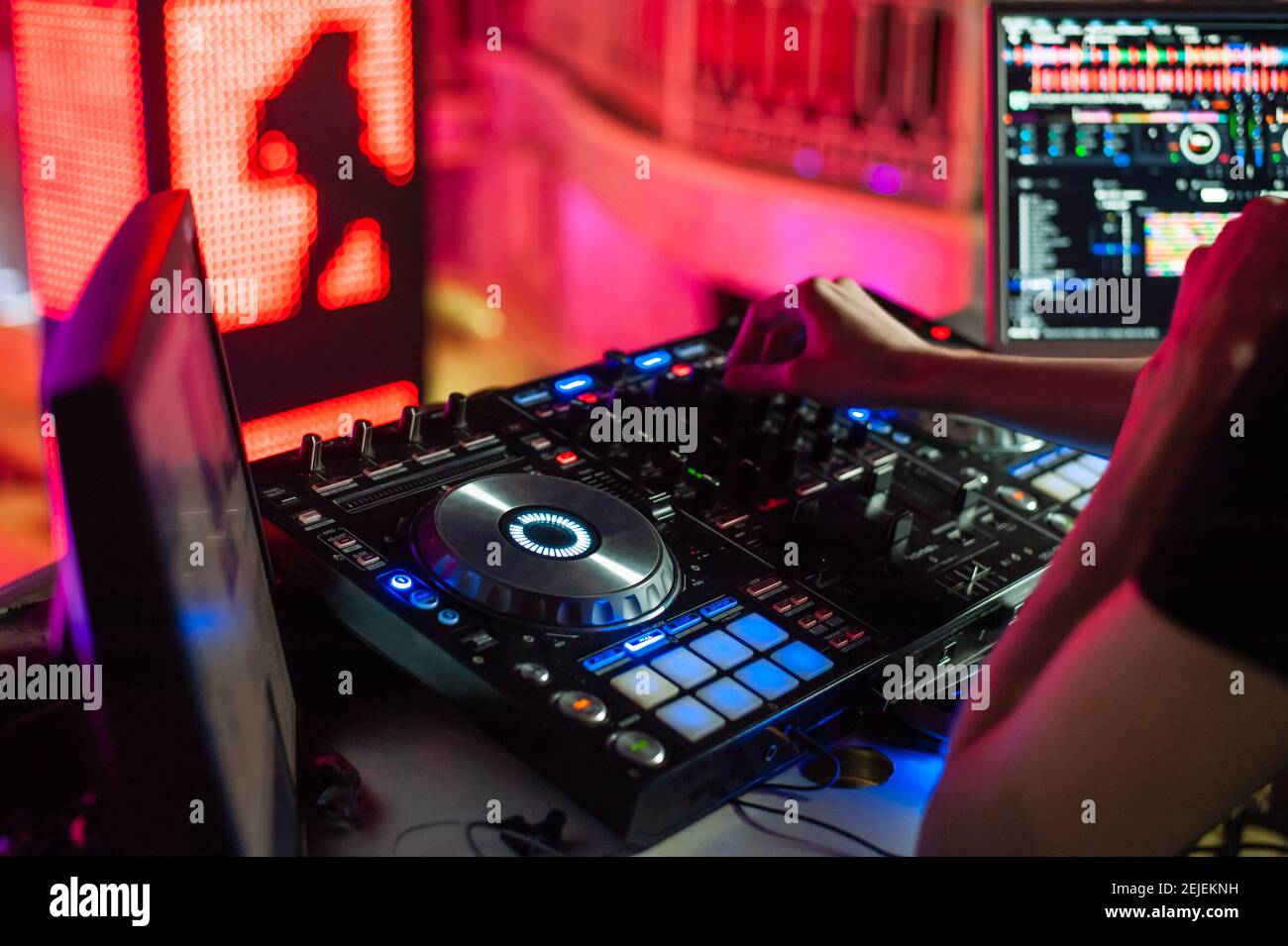 Dj mixes the track in the nightclub at a party Stock Photo - Alamy