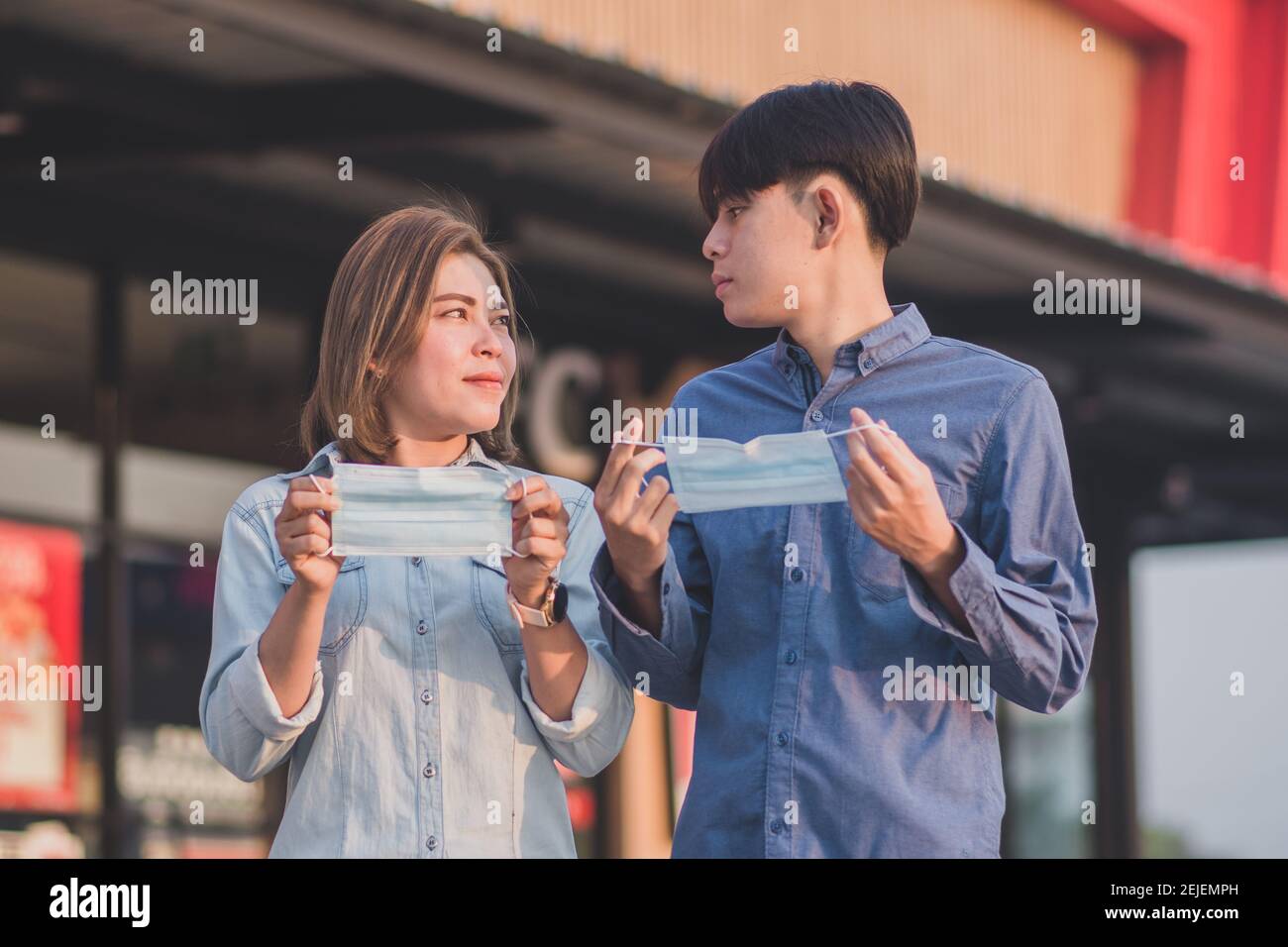 two people wear face mask protect coronavirus covid 19 walk on city ...