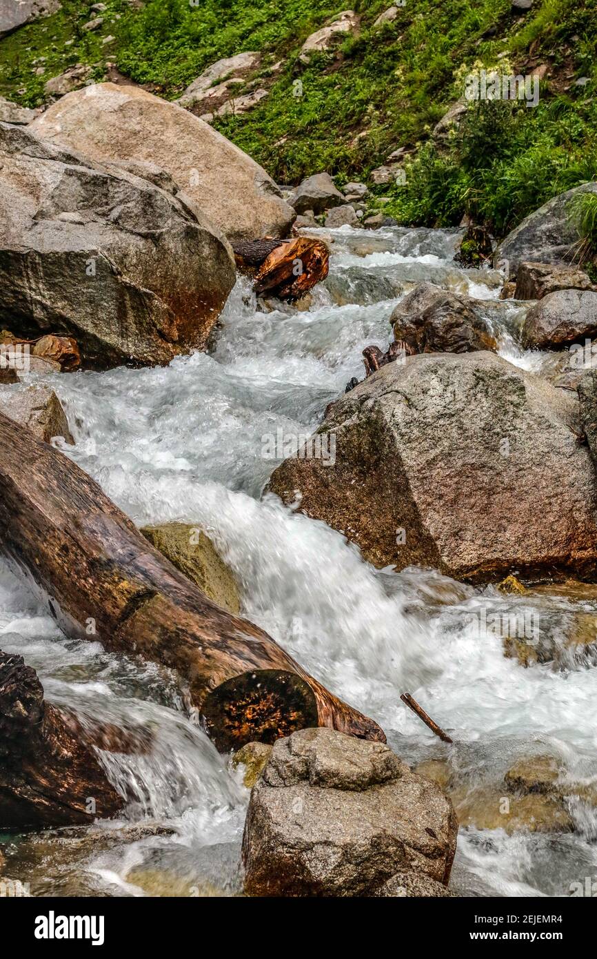 Vertical shot of rapid water flow in Kumrat waterfall in Pakistan Stock ...