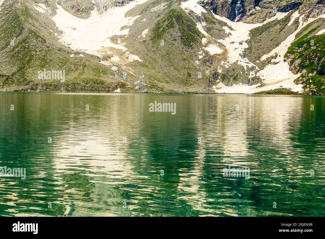 Scenic view of the Katora Lake with the reflection of the Kumrat Valley ...